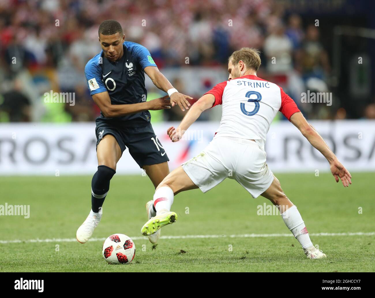 Kylan Mbappe of France goes past Ivan Strinic of Croatia during the ...