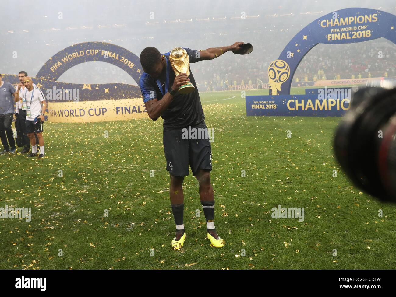 Paul Pogba of France holds the world cup trophy and does a dab ...