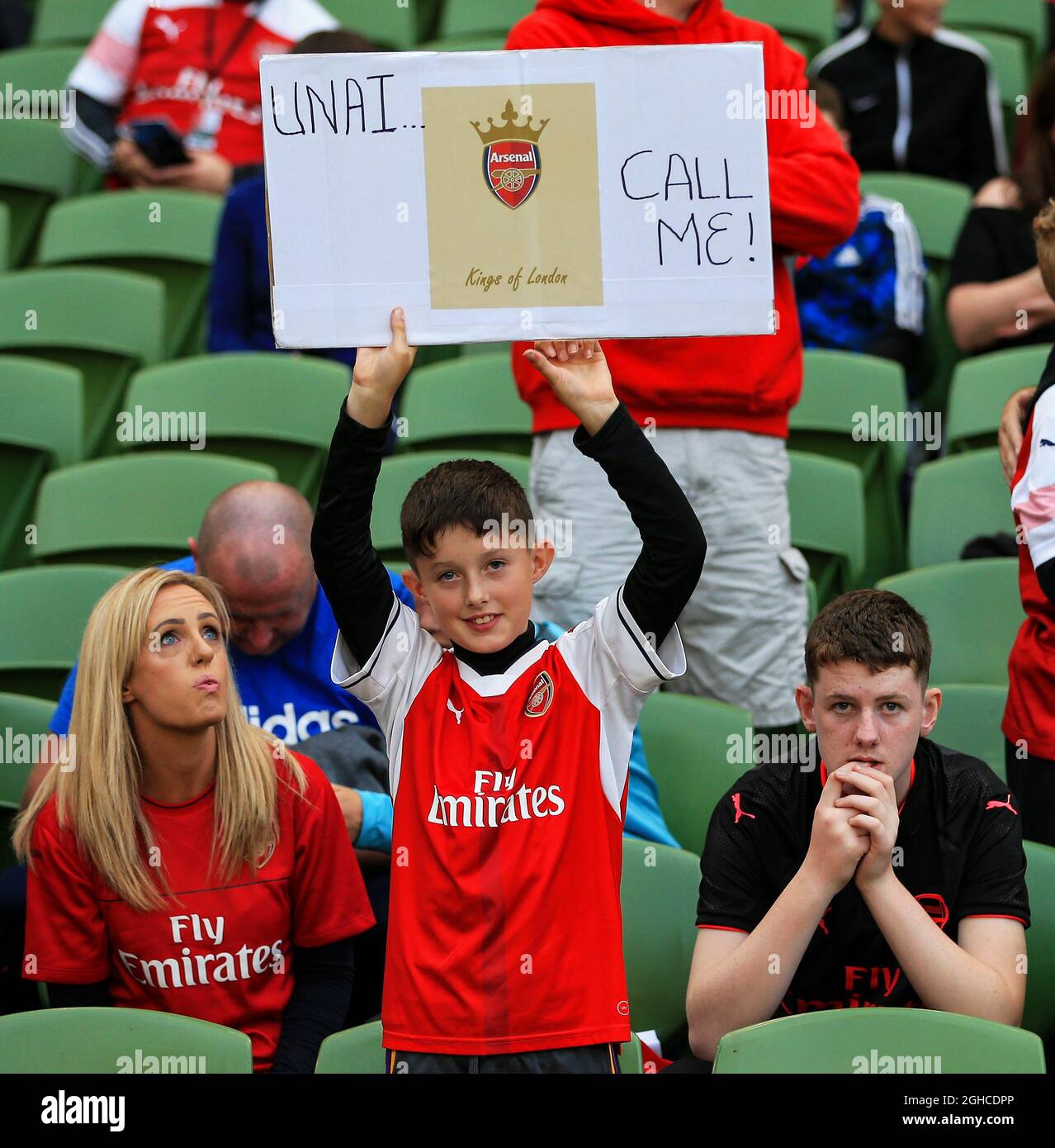 An arsenal fan holds hi-res stock photography and images - Alamy
