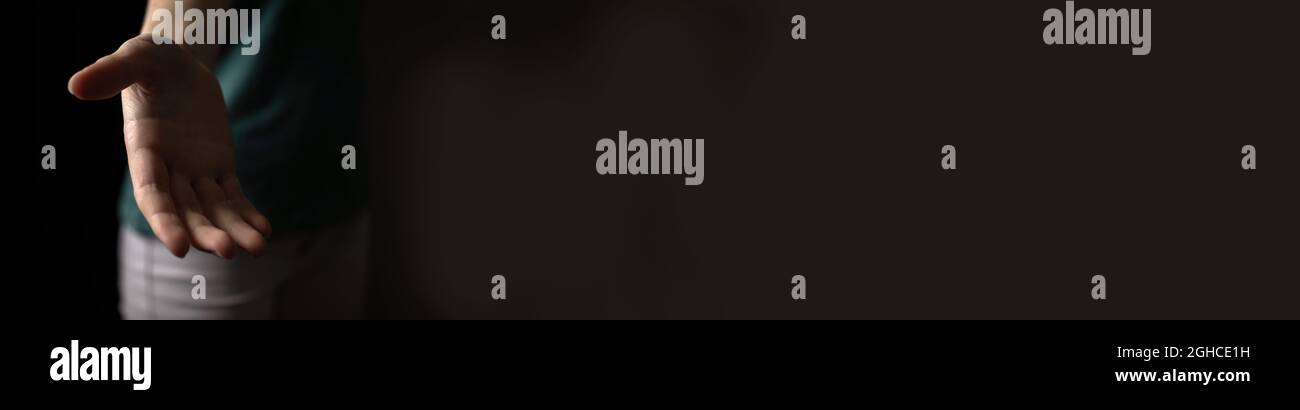 Opened hand giving some help. Young woman offering helping hand. Banner ...