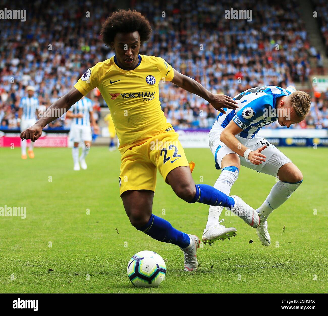 Chelsea's Willian takes on Huddersfield Town's Florent Hadergjonaj ...