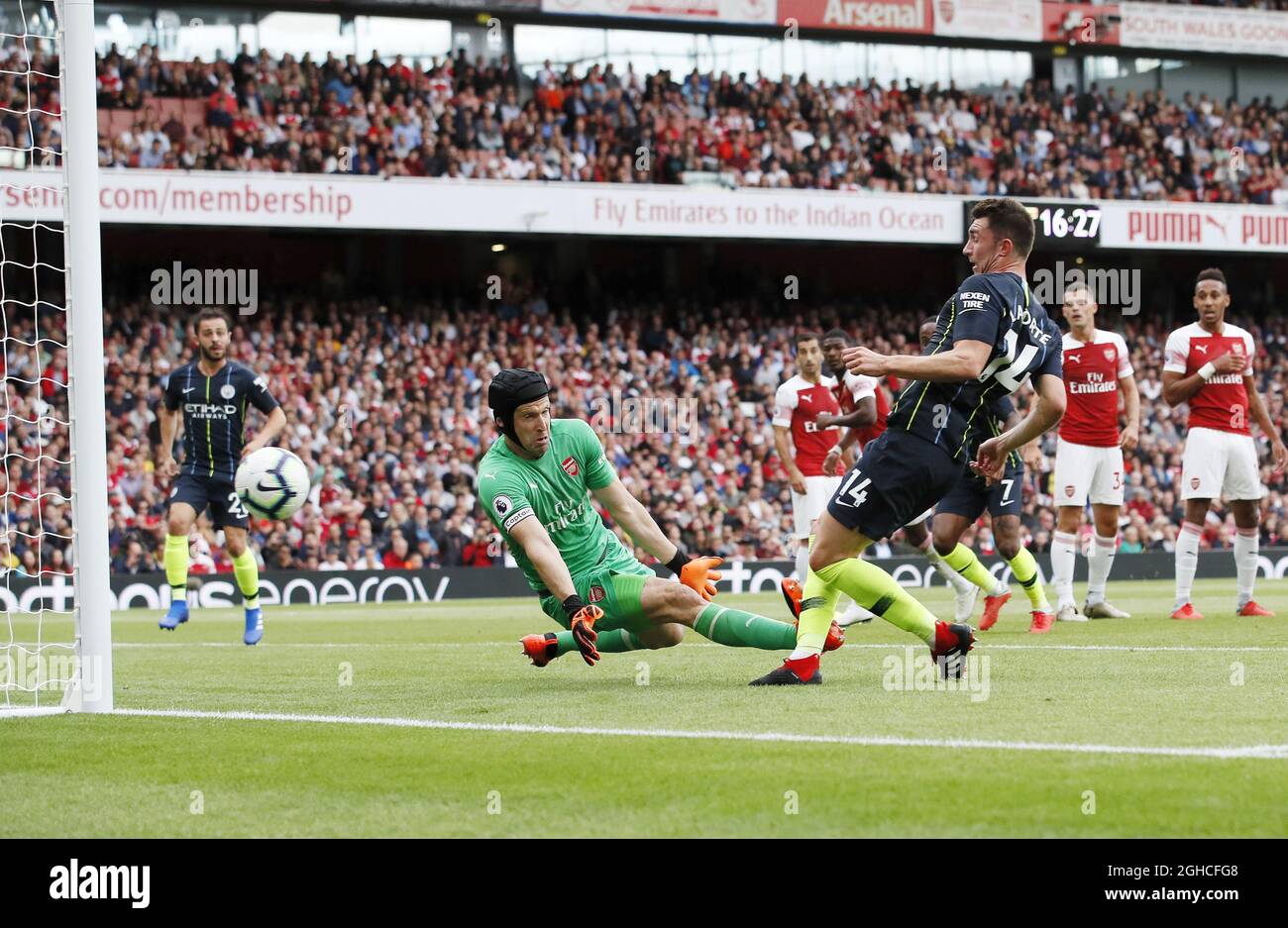 Arsenal's Petr Cech saves from Manchester City's Aymeric Laporte during ...