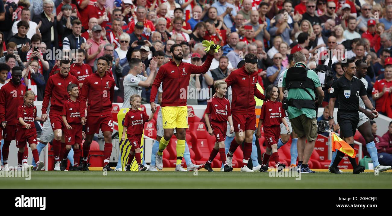 Alisson Becker of Liverpool prays to god as he walks out during the ...