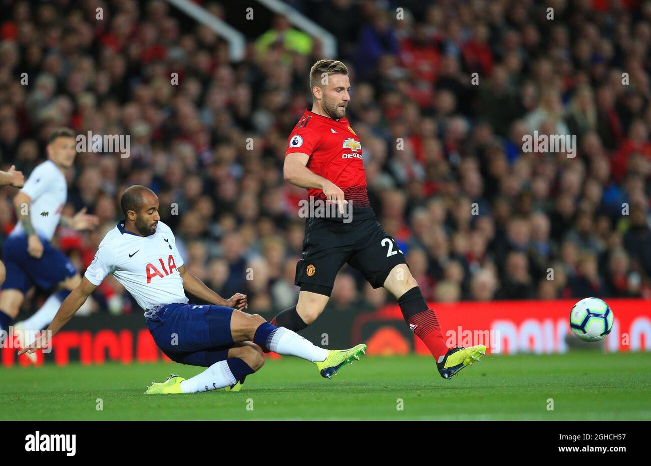 Lucas of Tottenham tackles Luke Shaw of Manchester United during the ...