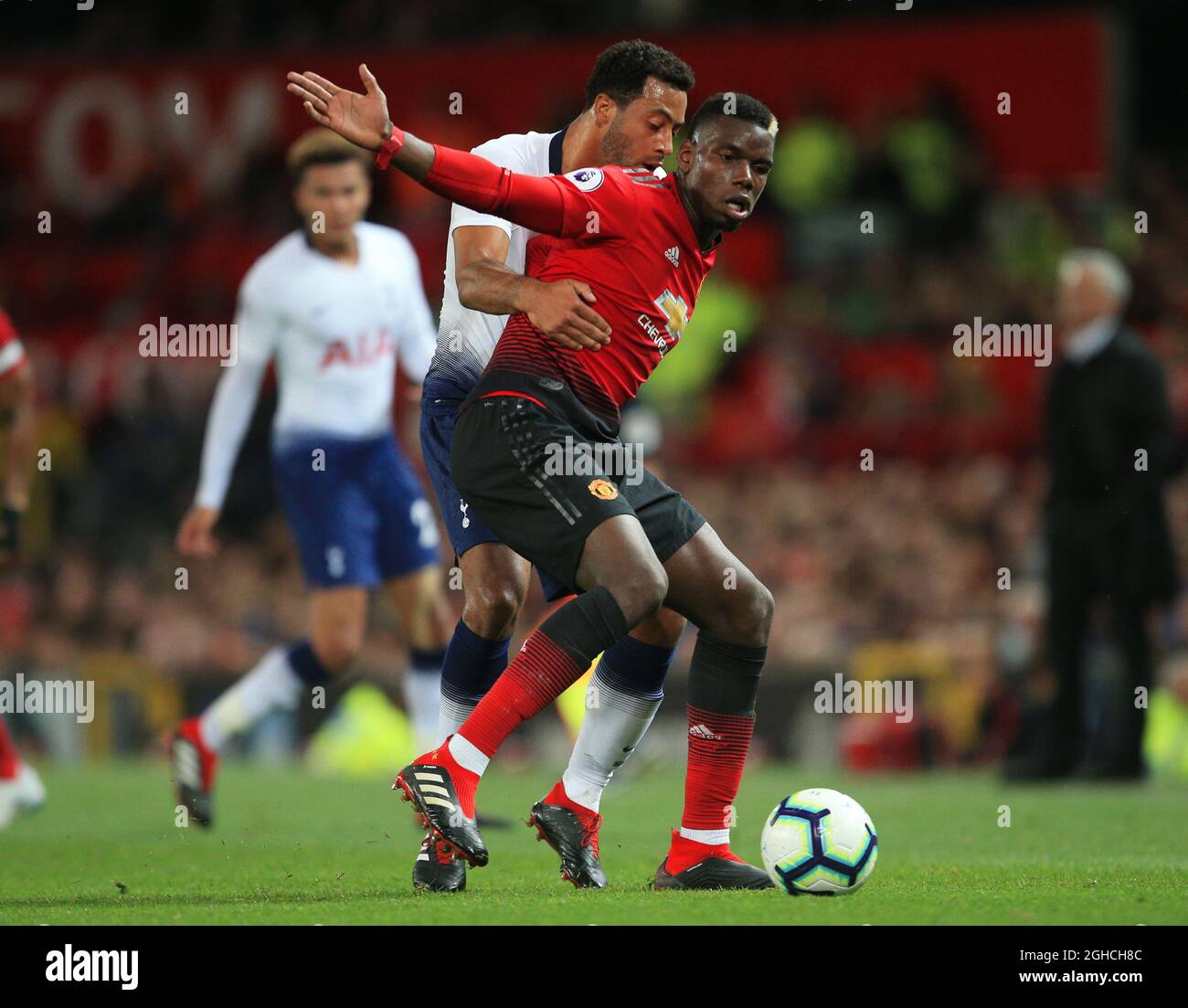 Paul Pogba of Manchester United challenged by Mousa Dembele of ...