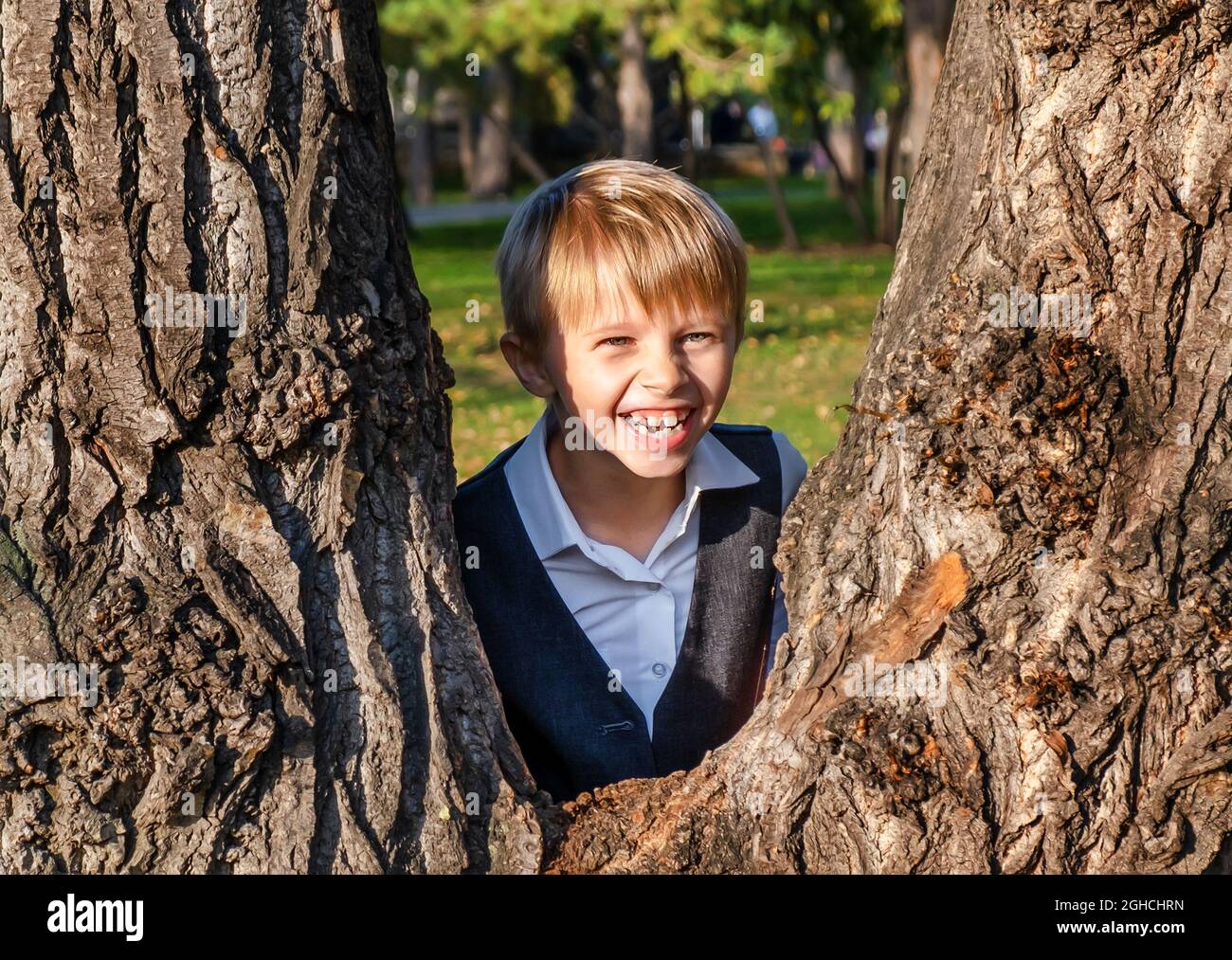 Happy Kid playing in the Summer Park Stock Photo - Alamy