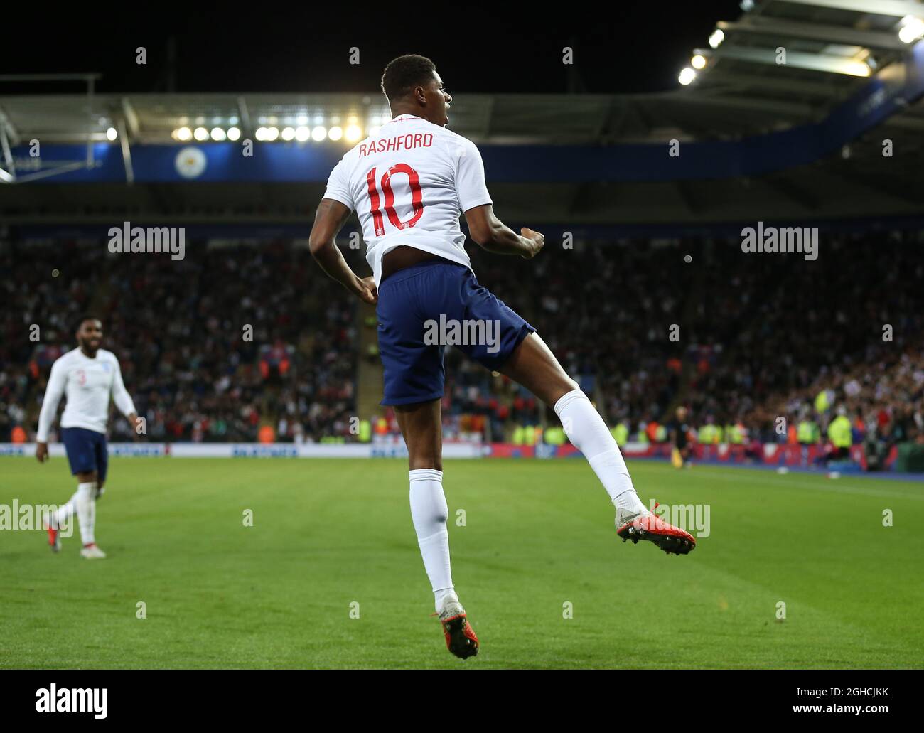 Marcus Rashford of England celebrates scoring the first goal during the ...