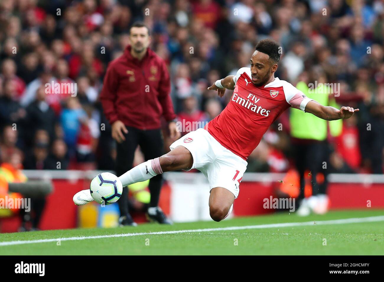 Pierre-Emerick Aubameyang of Arsenal attempts to keep the ball in play ...