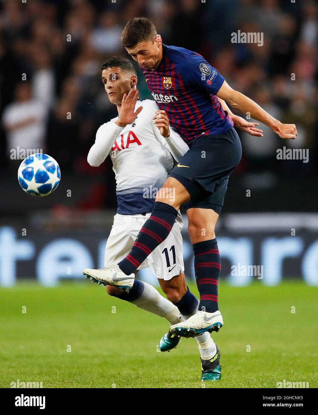 Barcelona's Clement Lenglet challenges Tottenham's Erik Lamela during ...