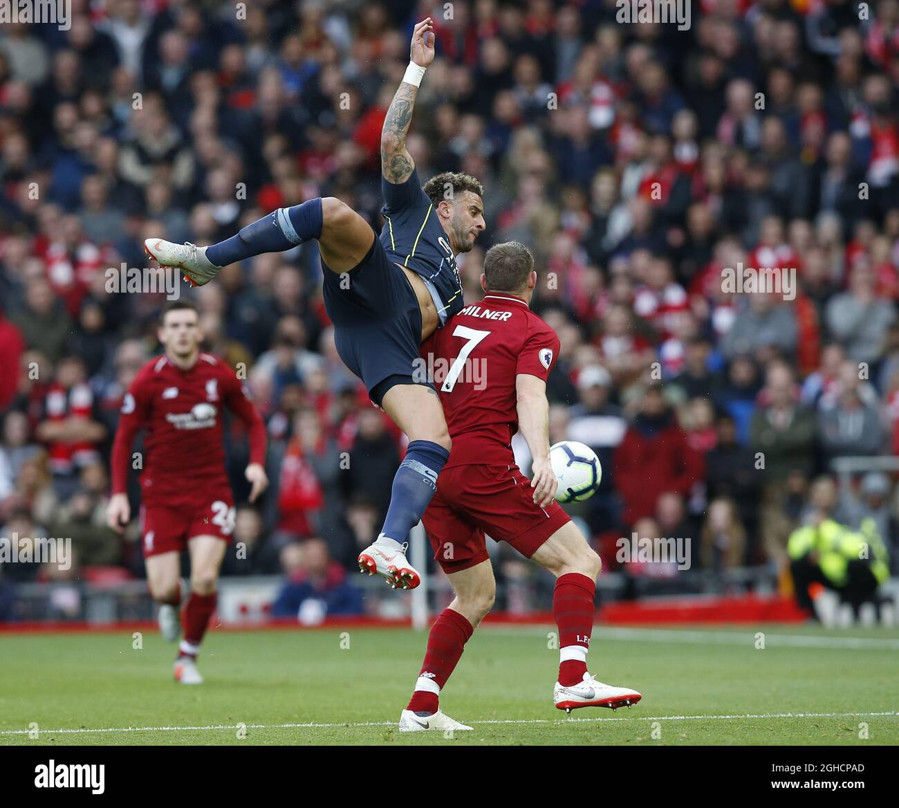 Kyle Walker of Manchester City challenges James Milner of Liverpool ...