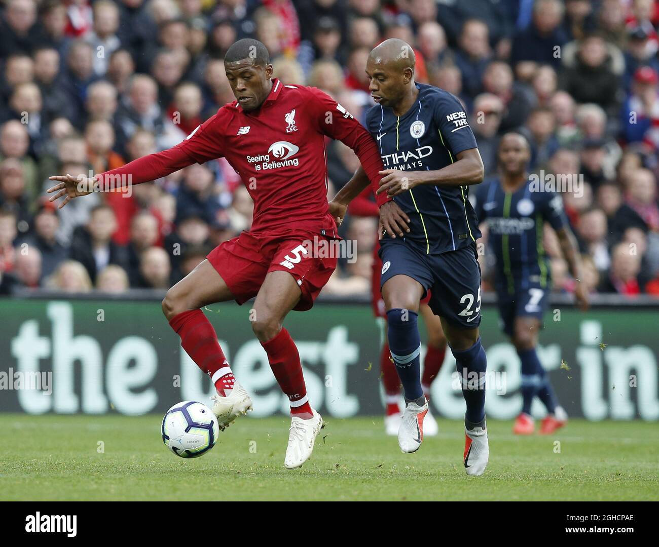 Georgina Wijnaldum of Liverpool tussles with Fernandinho of Manchester ...