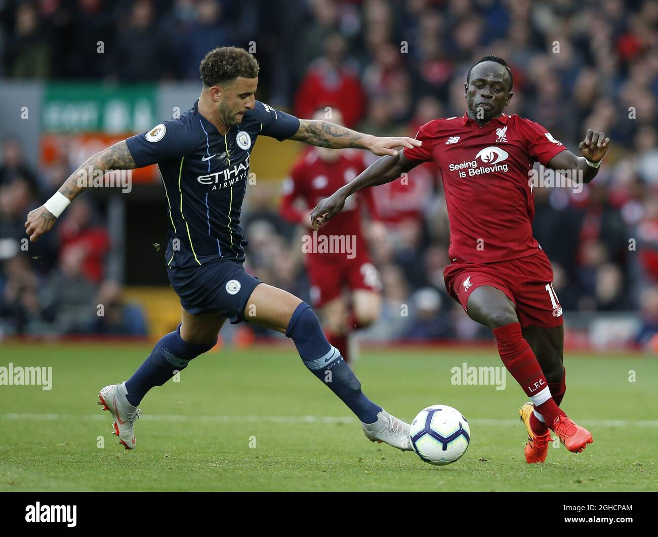 Kyle Walker of Manchester City intercepts Sadio Mane of Liverpool ...