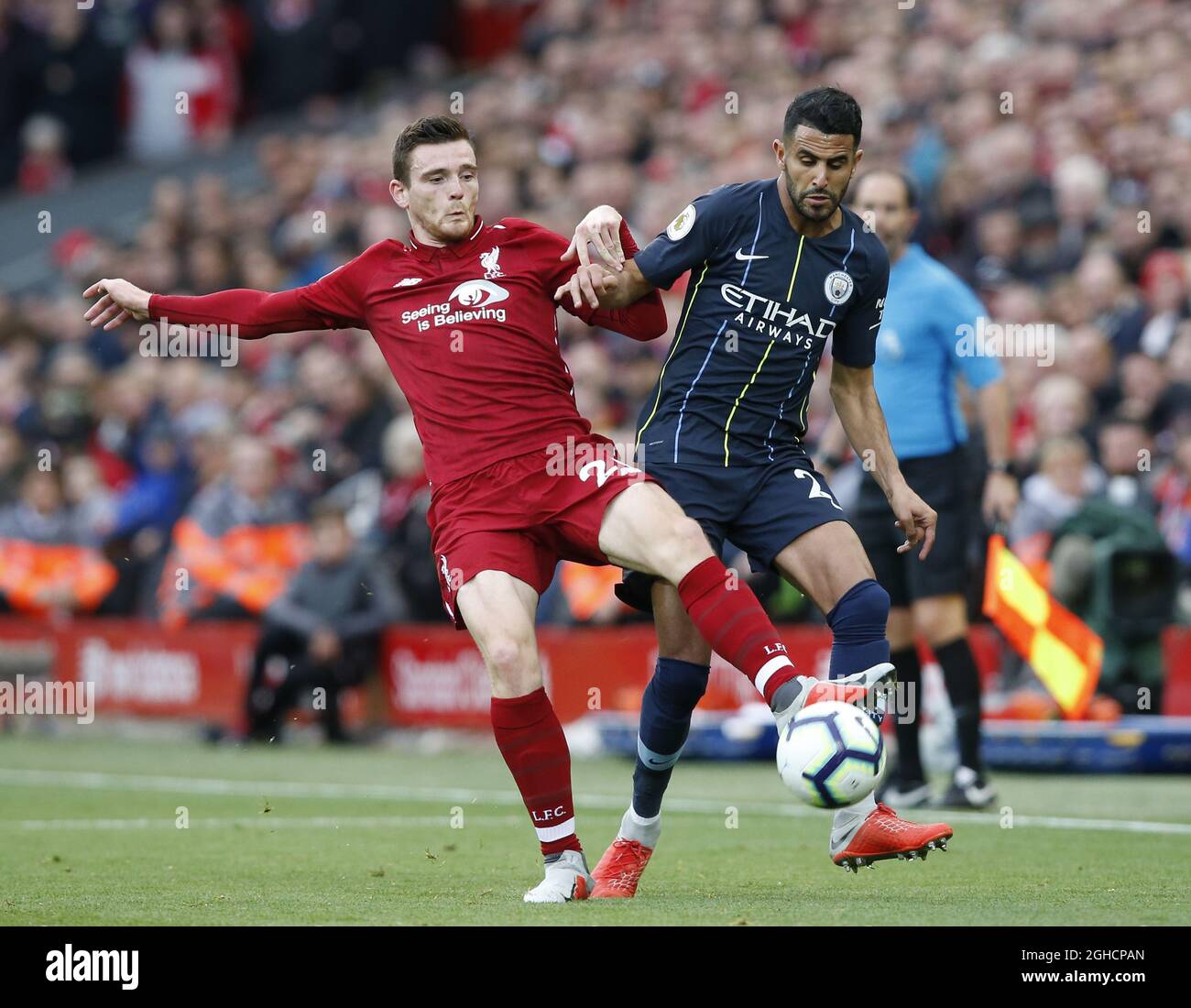 Andrew Robertson of Liverpool tackles Riyad Mahez of Manchester City ...