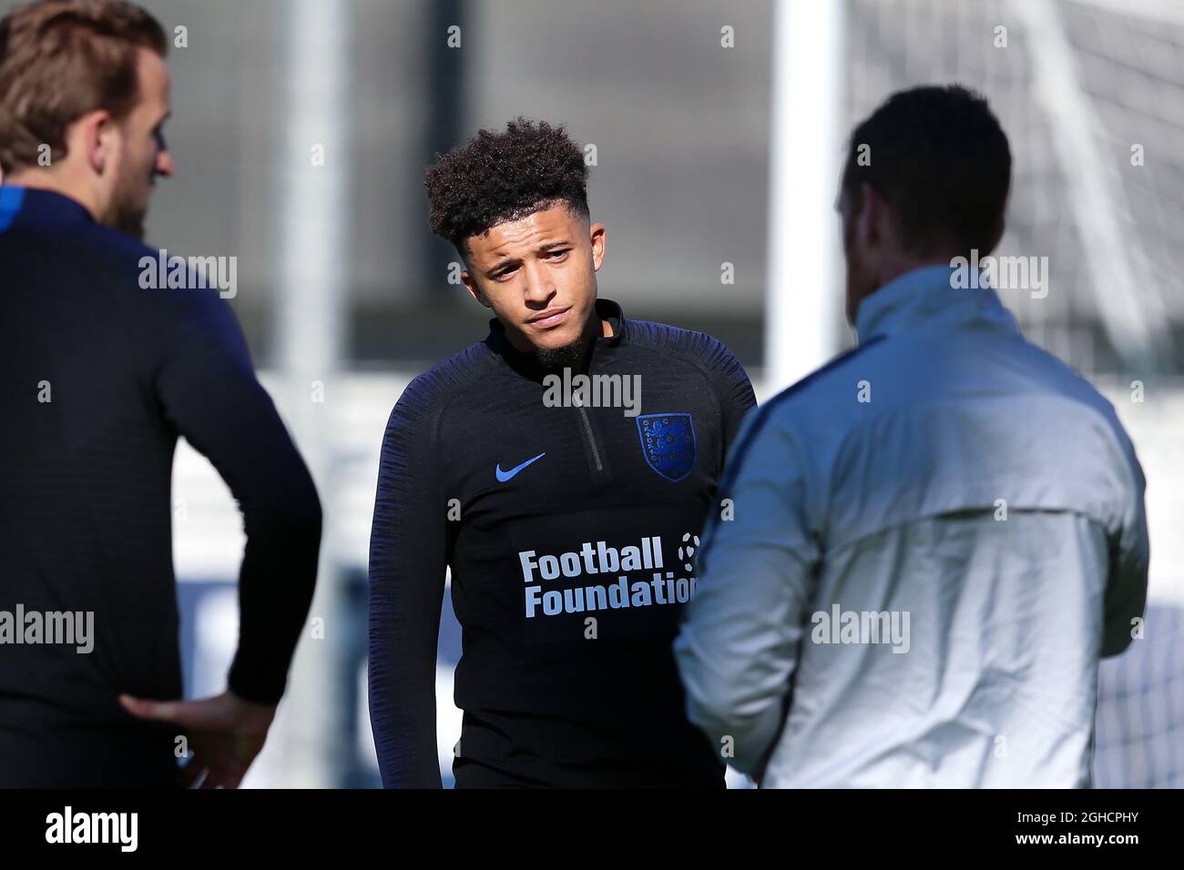 Jadon Sancho listens to a coach during the England senior squad ...