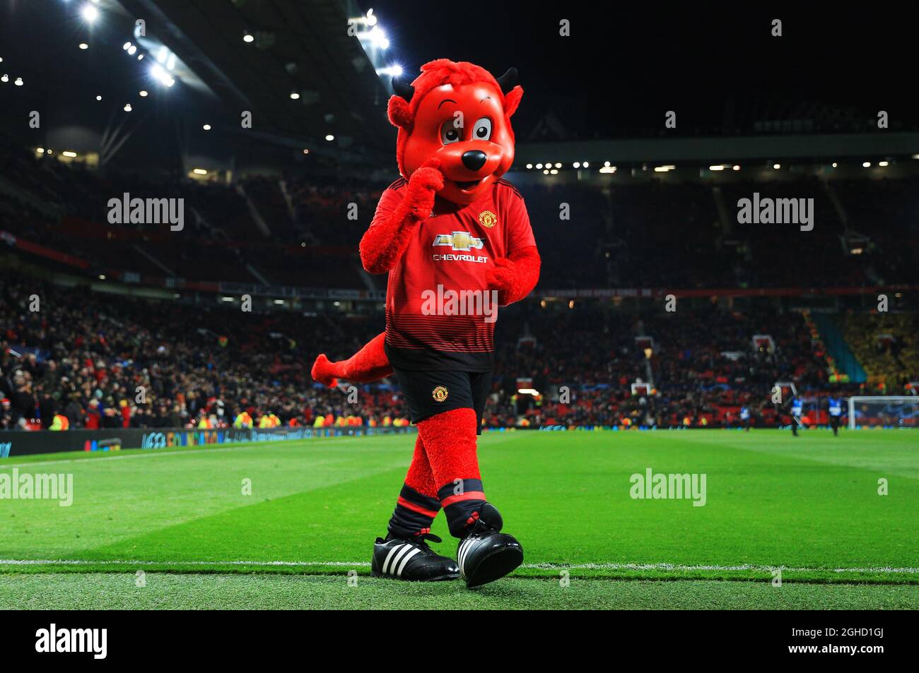 Manchester United mascot Fred the Red greets the crowd at half time ...