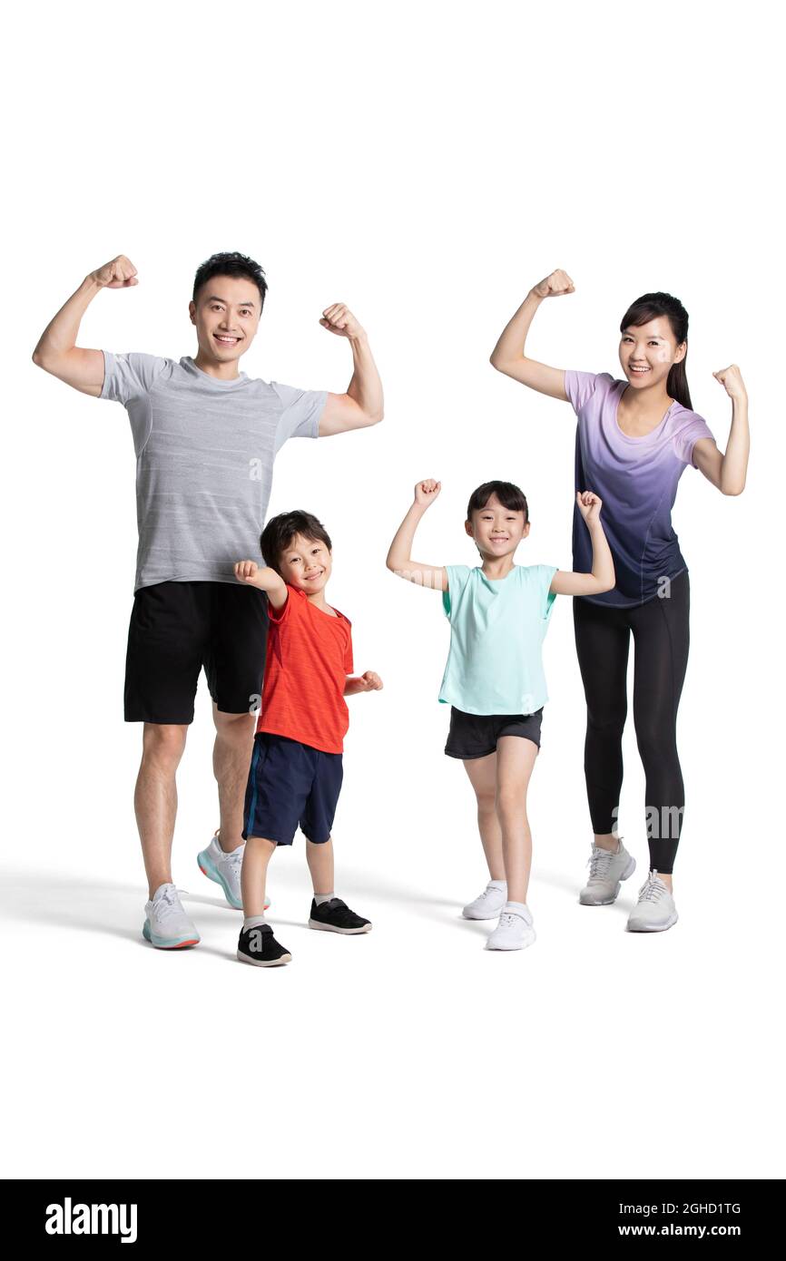 Happy young family exercising together Stock Photo - Alamy Happy young family exercising together Stock Photo - Alamy