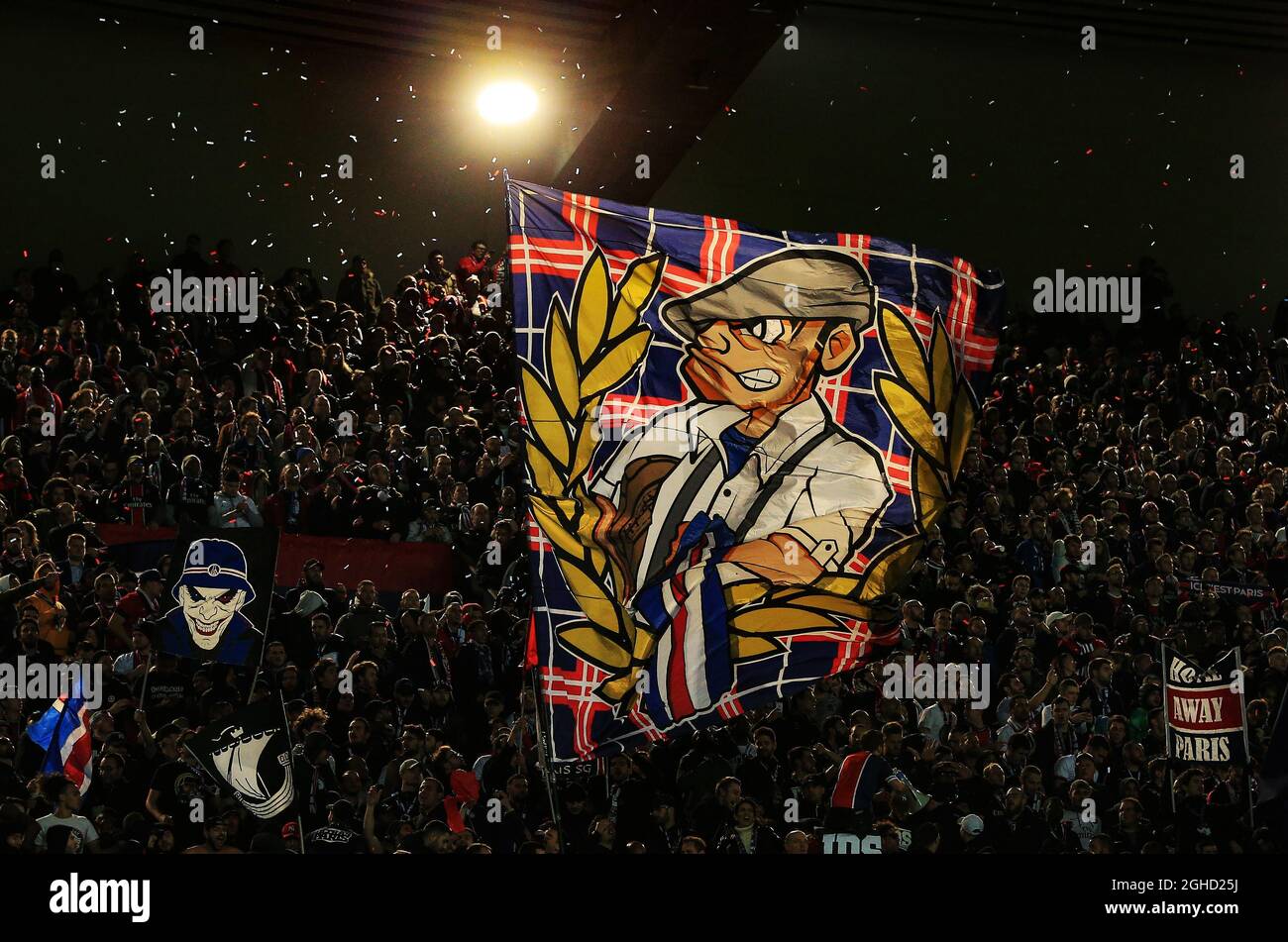 Paris Saint-Germain fans wave a flag during the UEFA Champions League ...