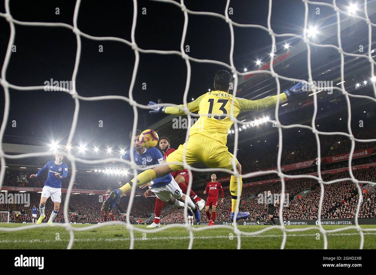 Alisson Becker of Liverpool saves from a header by Andre Gomes of ...