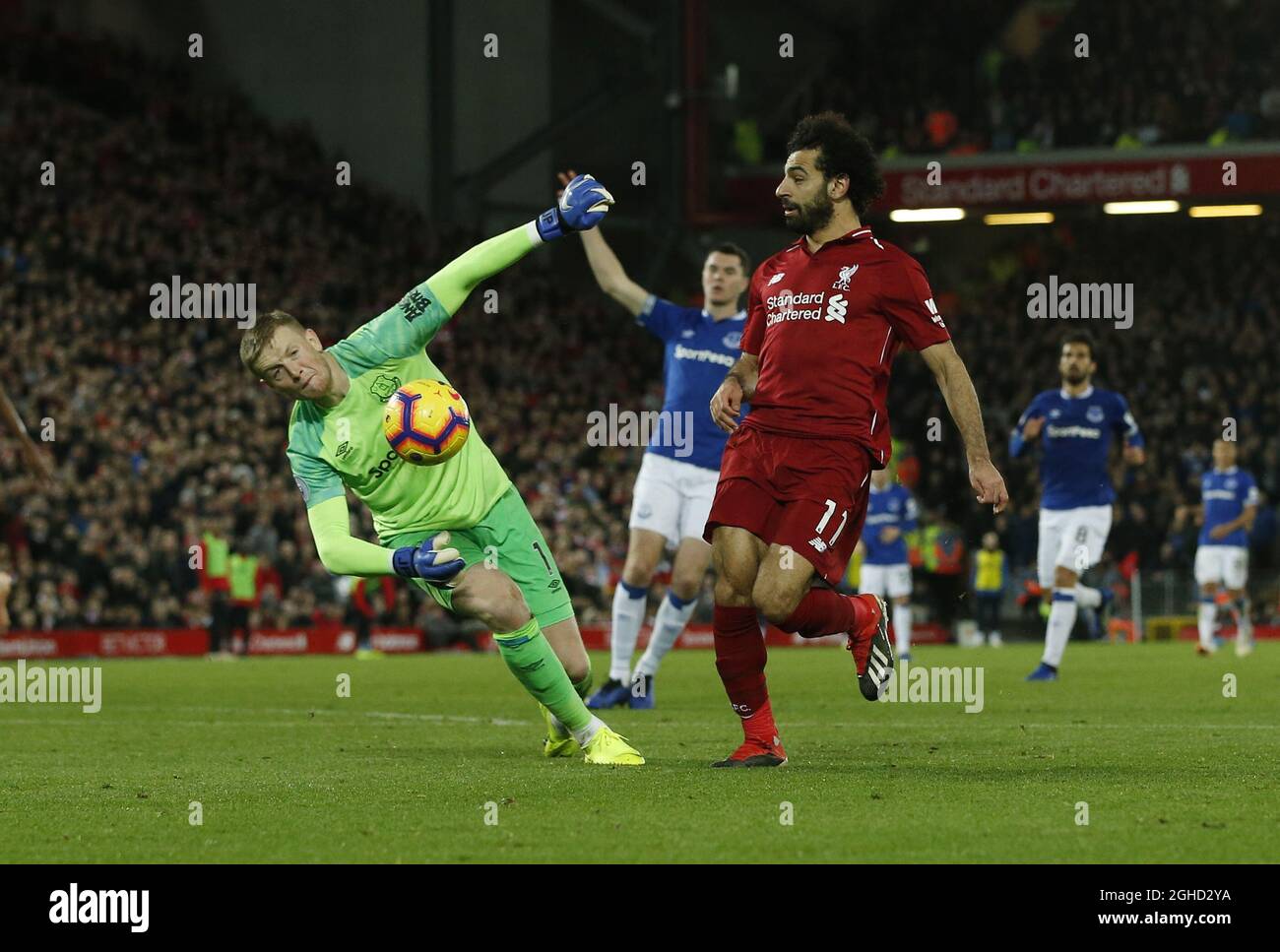 Jordan Pickford of Everton saves from Mohamed Salah of Liverpool during ...