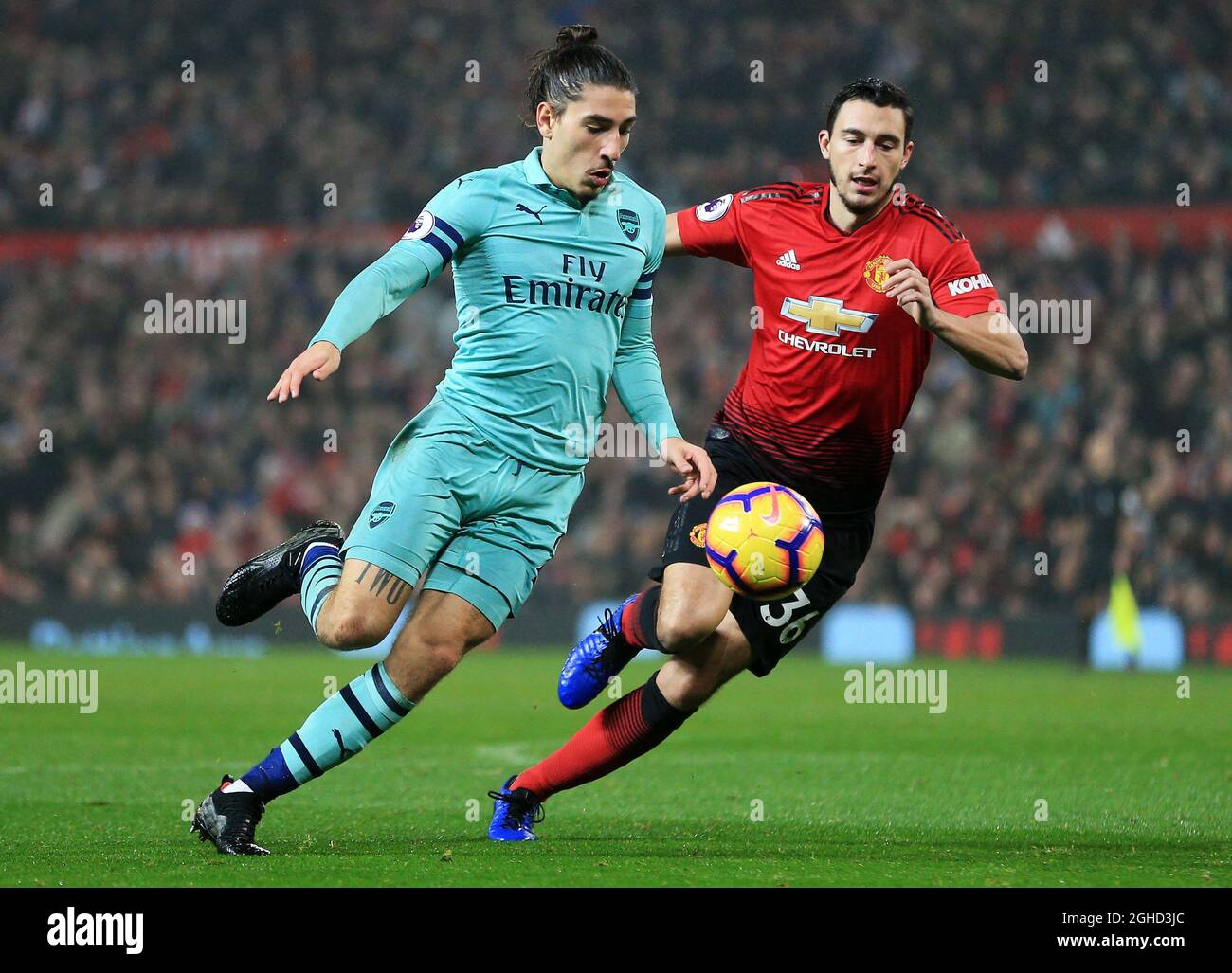 Hector Bellerin of Arsenal takes on Manchester United's Matteo Darmian ...