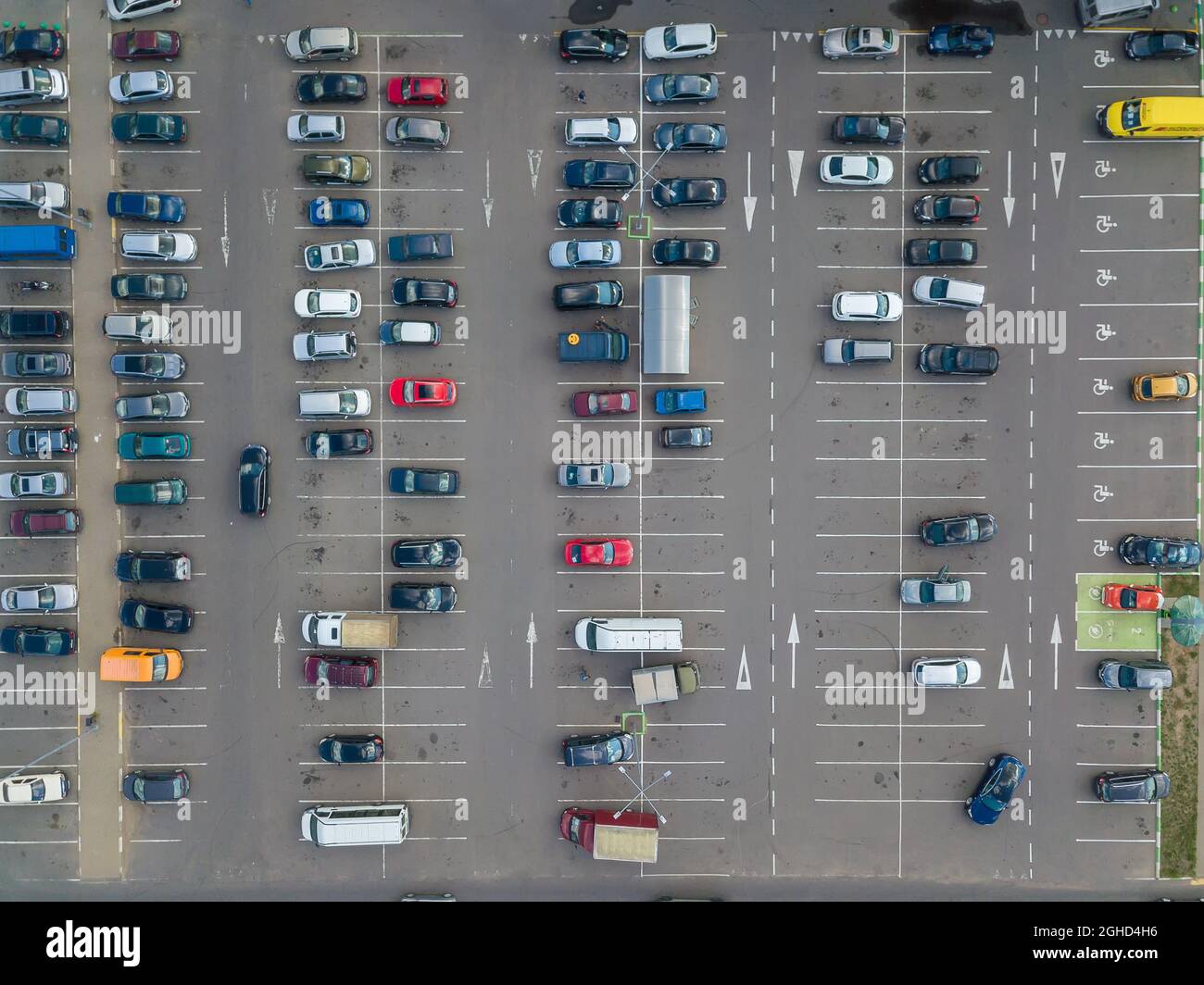 Drone view of a large car parking lot on a sunny summer day, horizontal ...