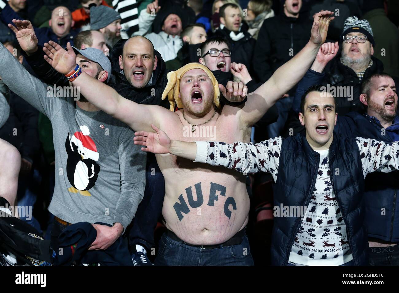 A Newcastle United fan braves the cold weather during the Premier ...
