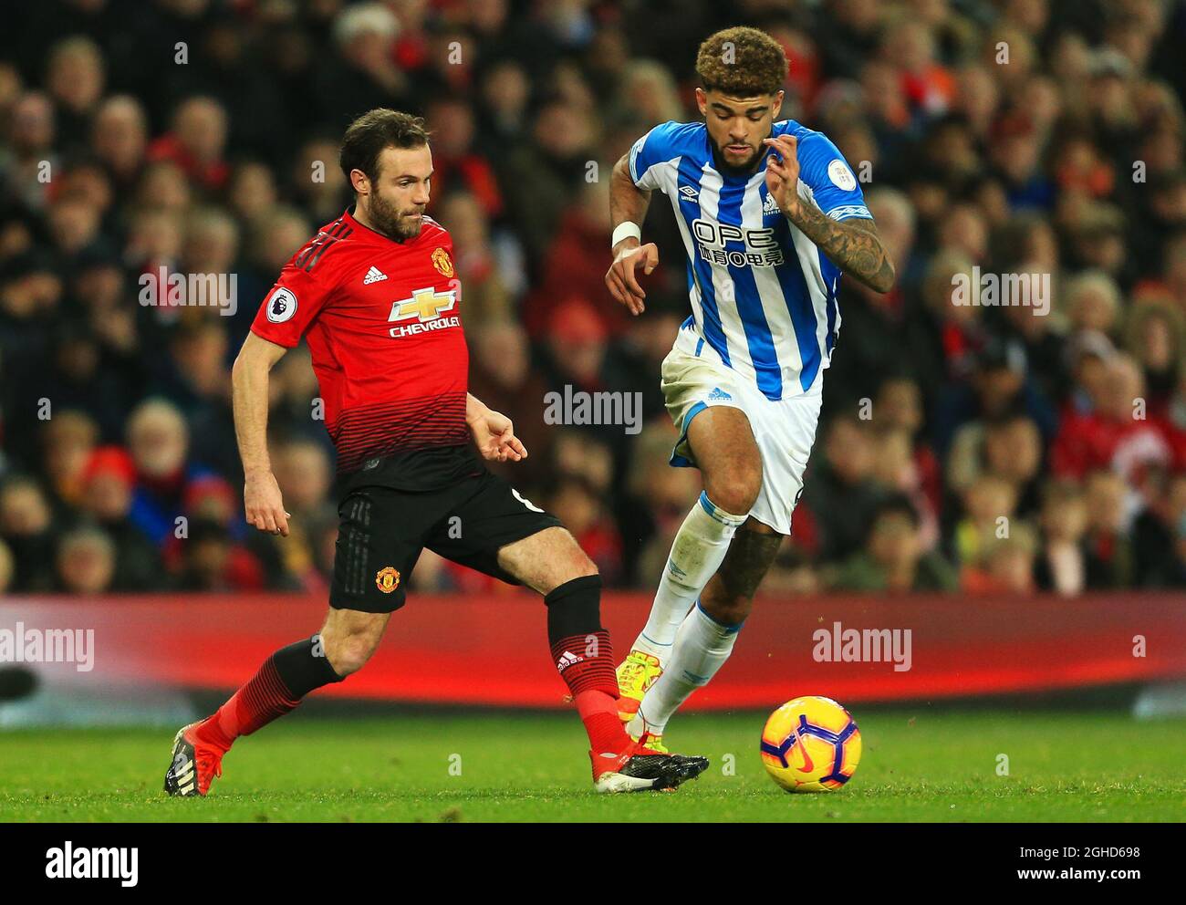 Manchester United's Juan Mata challenges Huddersfield Town's Philip ...