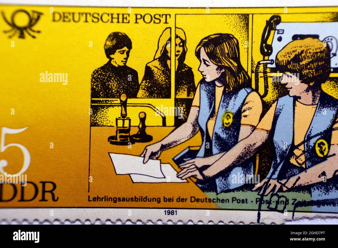 A postage stamp printed in German Democratic Republic shows student ...