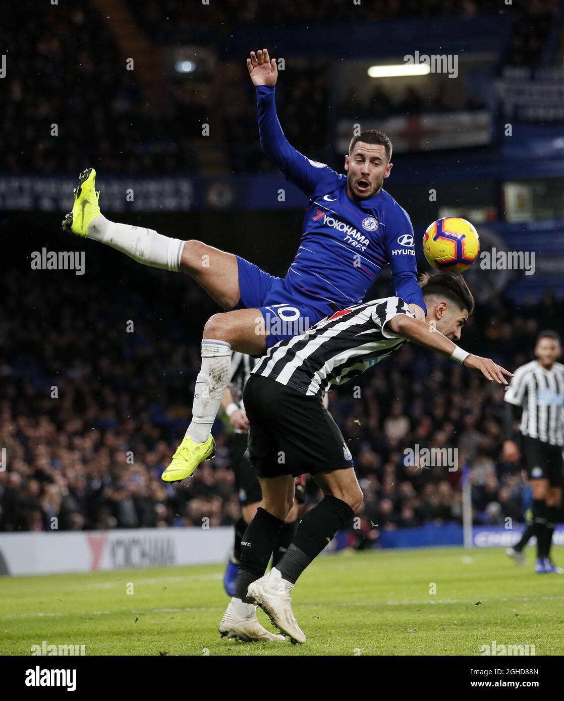 Chelsea's Eden Hazard tussles with Newcastle's Ayoze Perez during the ...