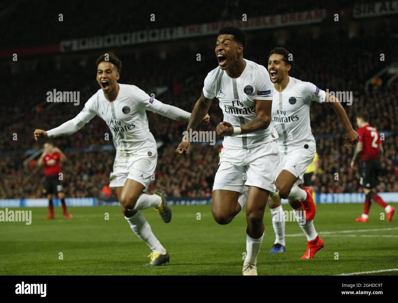 Presnel Kimpembe of PSG celebrates scoring the first goal during the ...