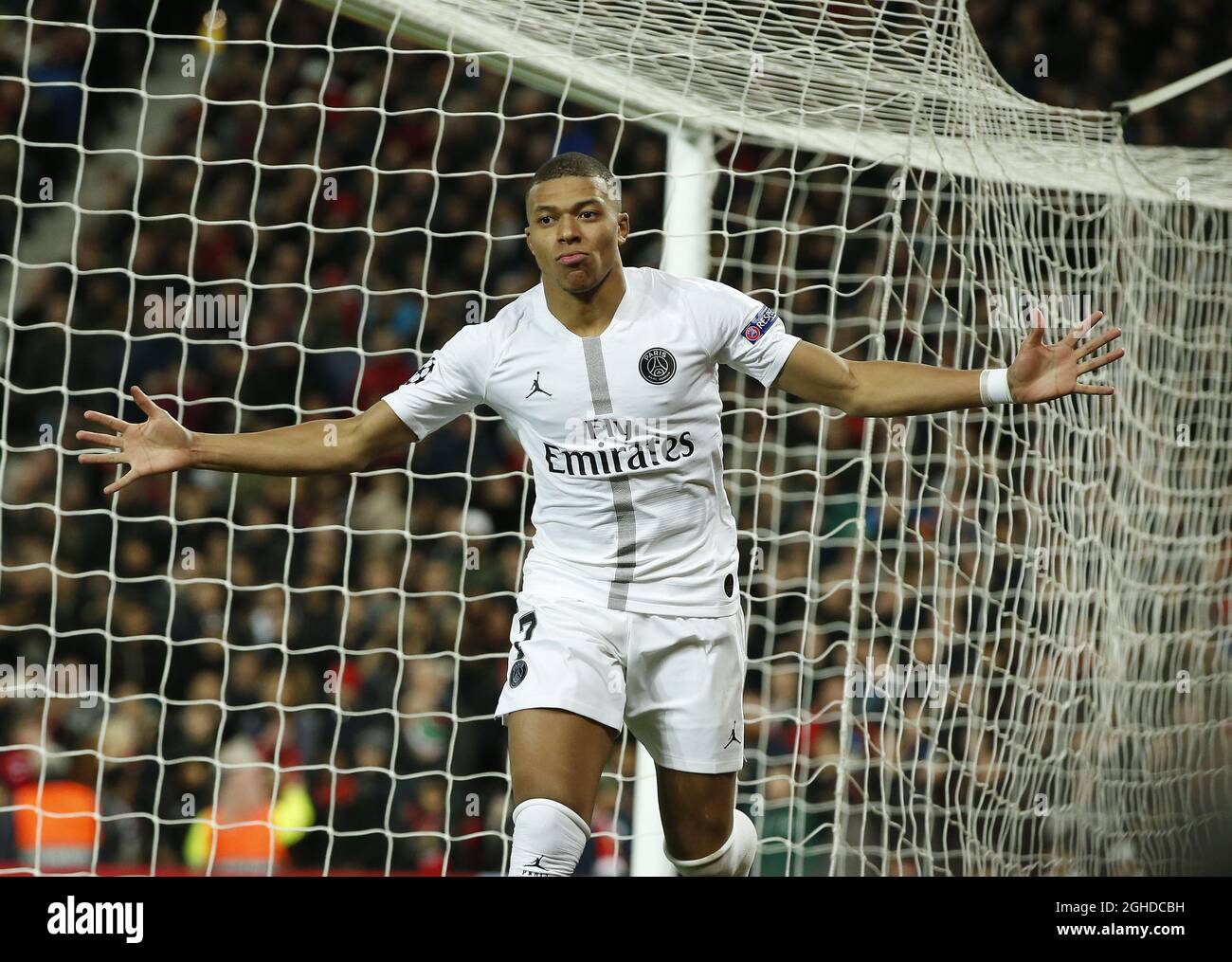 Kylian Mbappe of PS celebrates scoring the second goal during the UEFA ...