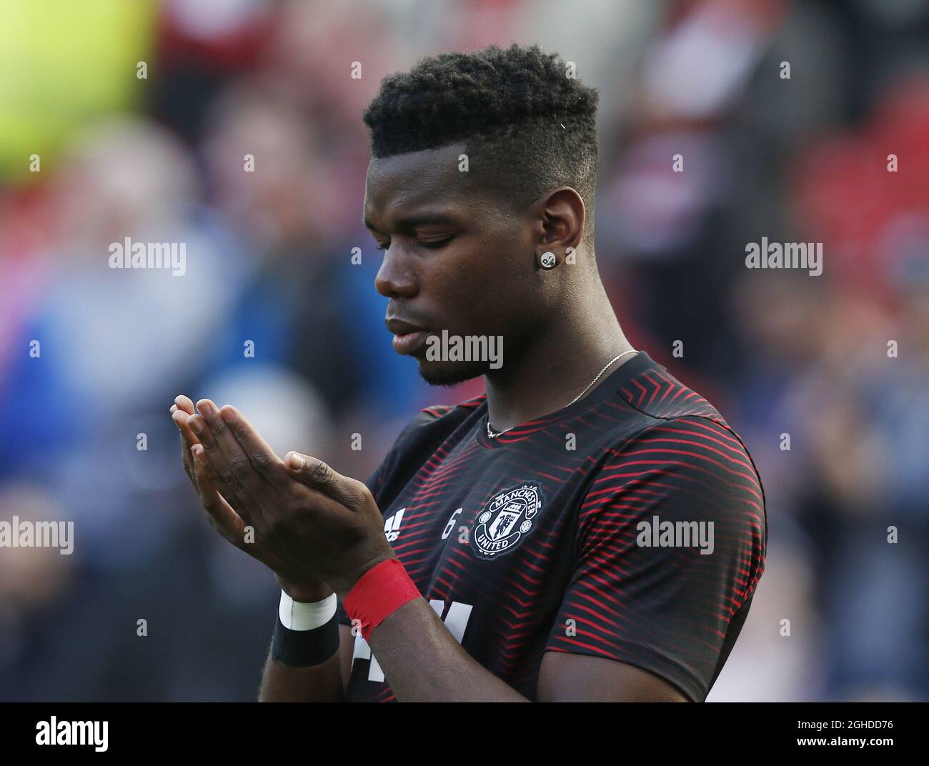Paul Pogba of Manchester United says a prayer before warm up during the ...