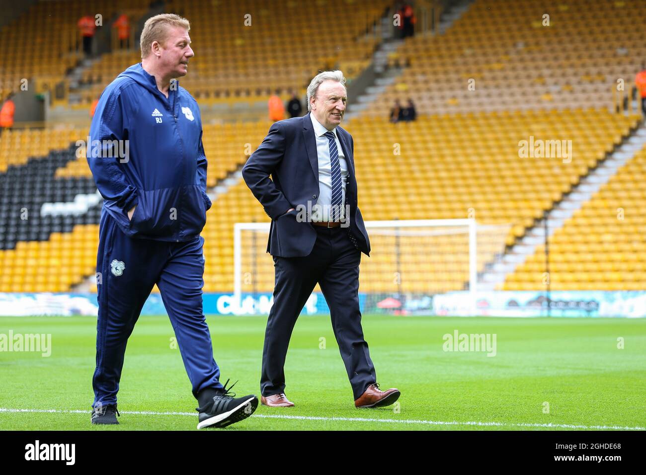 Neil Warnock (r) of Cardiff City walks off the pitch before the Premier ...