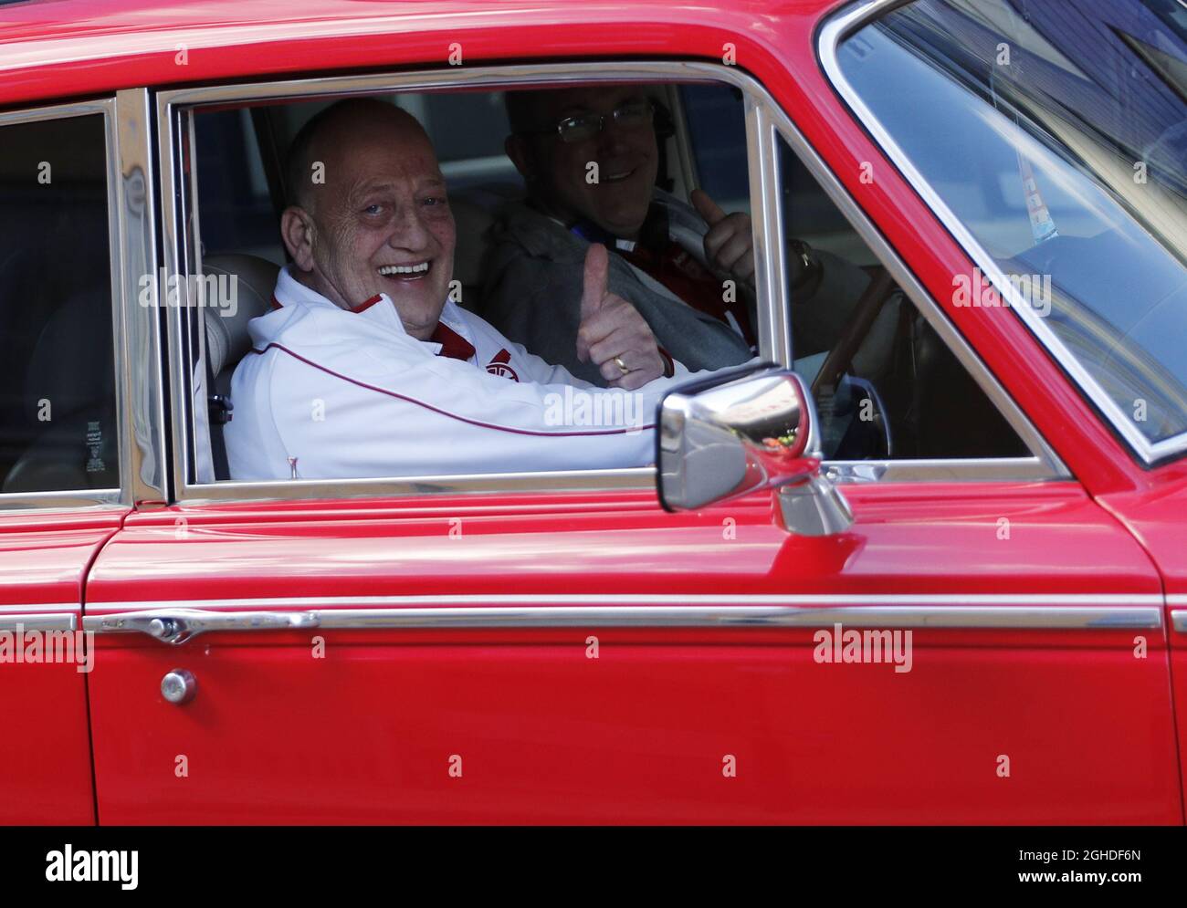 Arsenal fan David Skates arrives in his red Rolls Royce during the ...