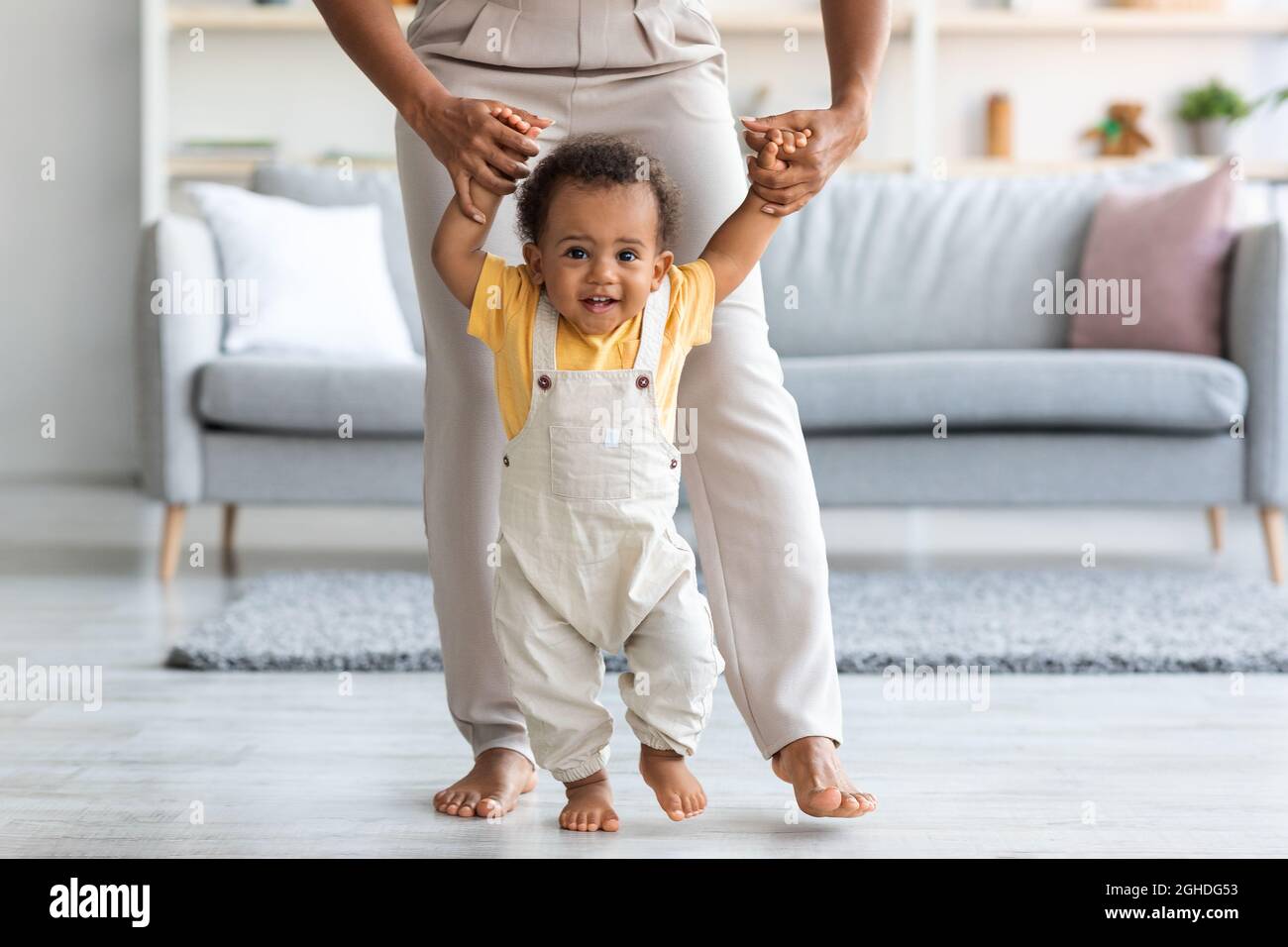 First steps black baby hi-res stock photography and images - Alamy