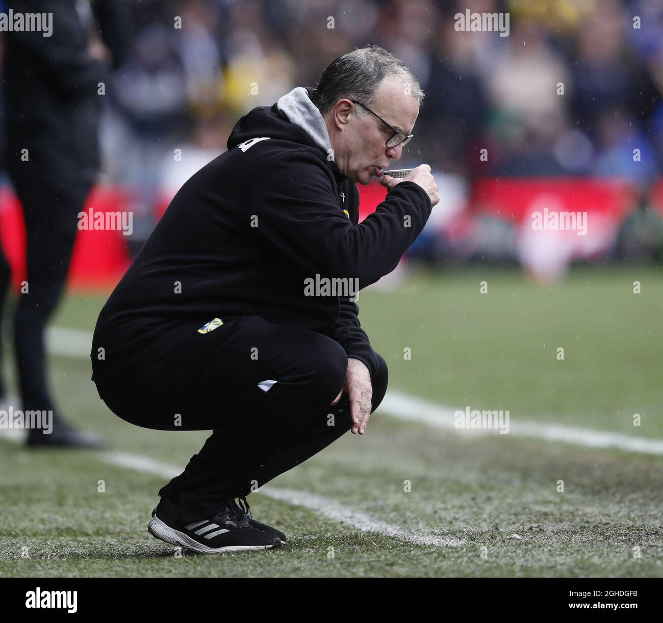 Marcelo Bielsa manager of Leeds United drinks a hot drink during the ...
