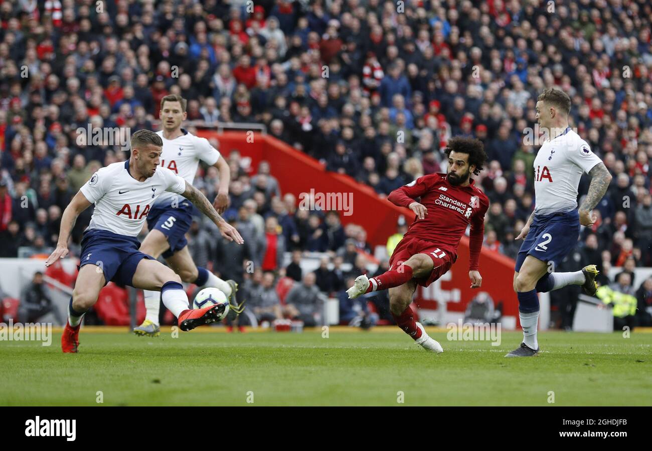 Toby Alderweireld of Tottenham blocks a shot from Mohamed Salah of ...