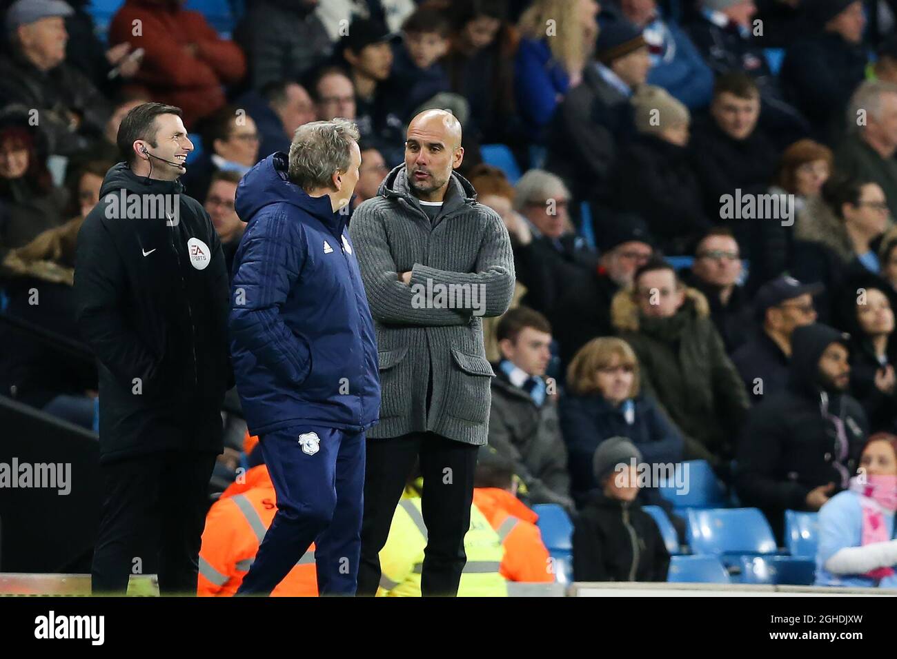 Neil Warnock of Cardiff City and Pep Guardiola of Manchester City talk ...