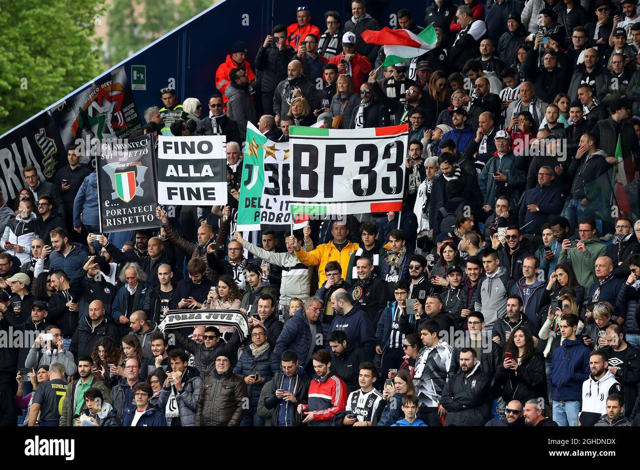 Travelling Juventus fans pictured at the stadium with flags and banners ...