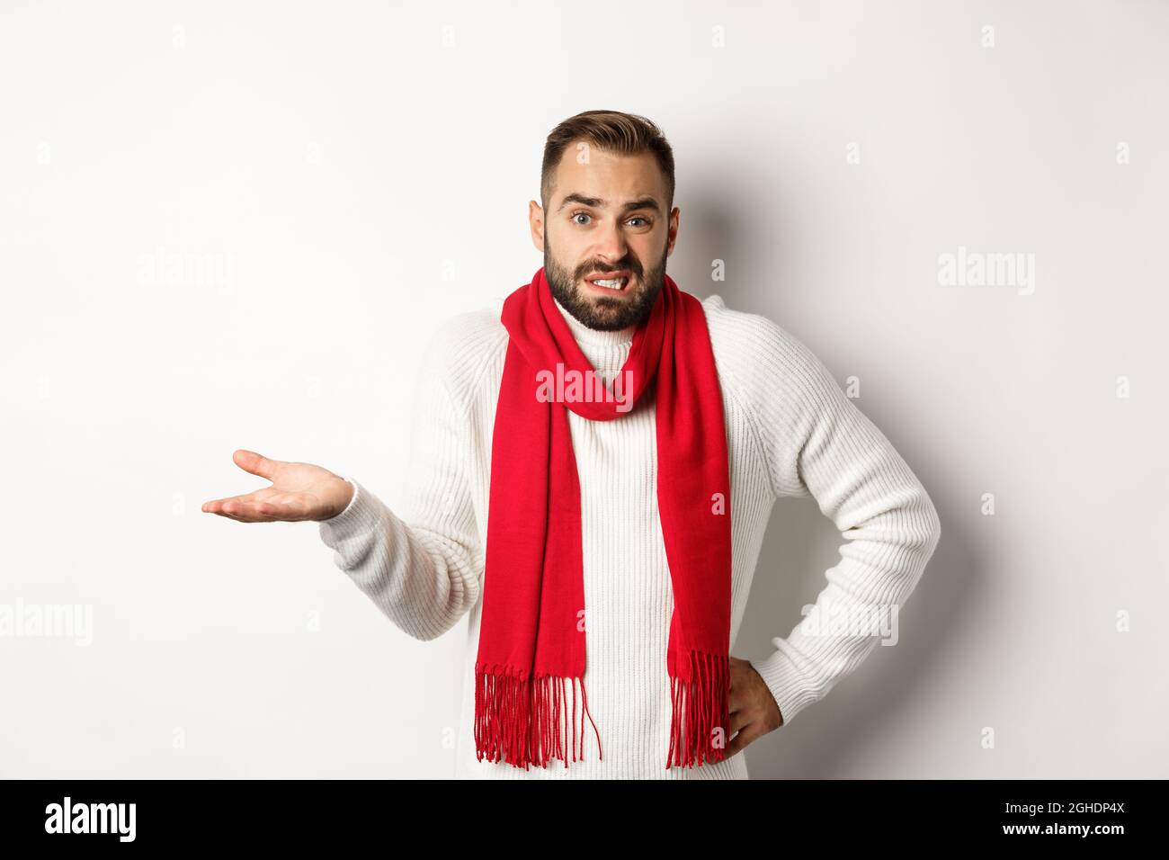 Clueless bearded man dont know, shrugging and saying sorry, standing ...