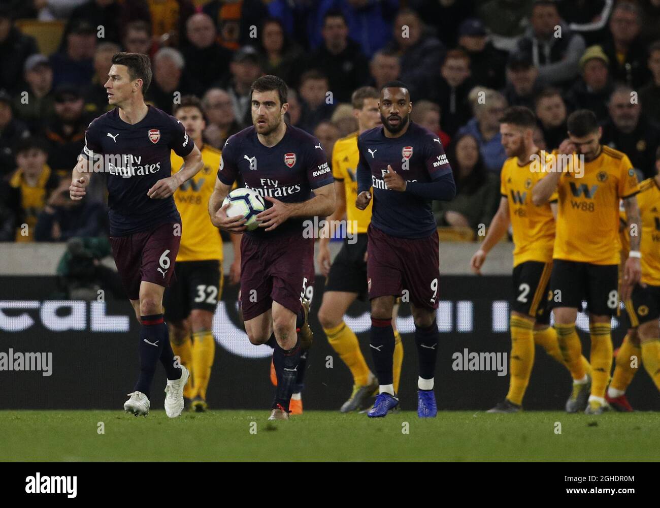 Sokratis Papastathopoulos of Arsenal collects the ball after scoring ...