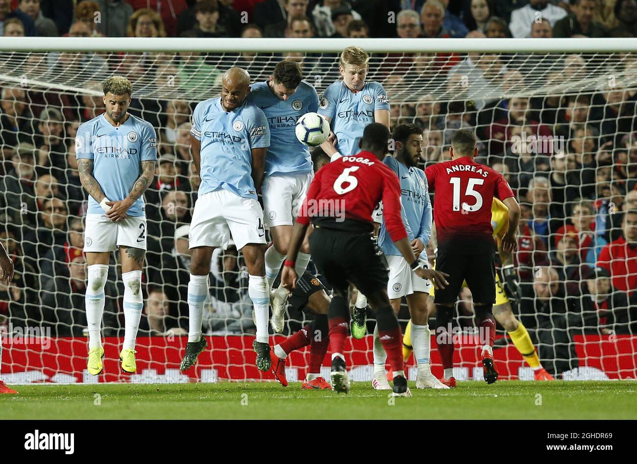 Paul Pogba of Manchester United sends a free kick into the defensive ...