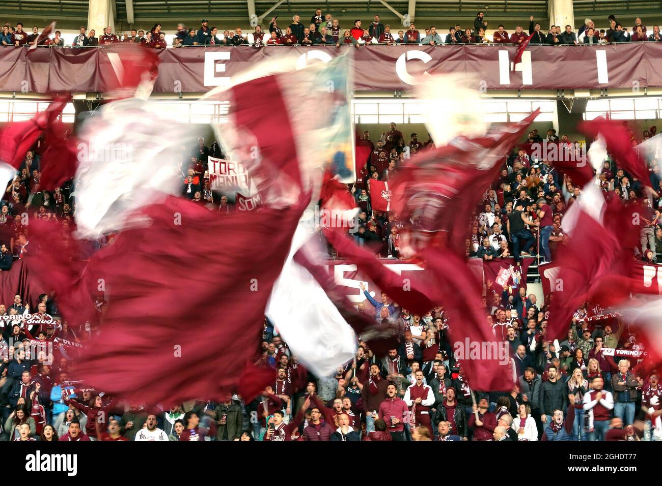 Torino FC fans pictured with scarves and flags during the Serie A match ...