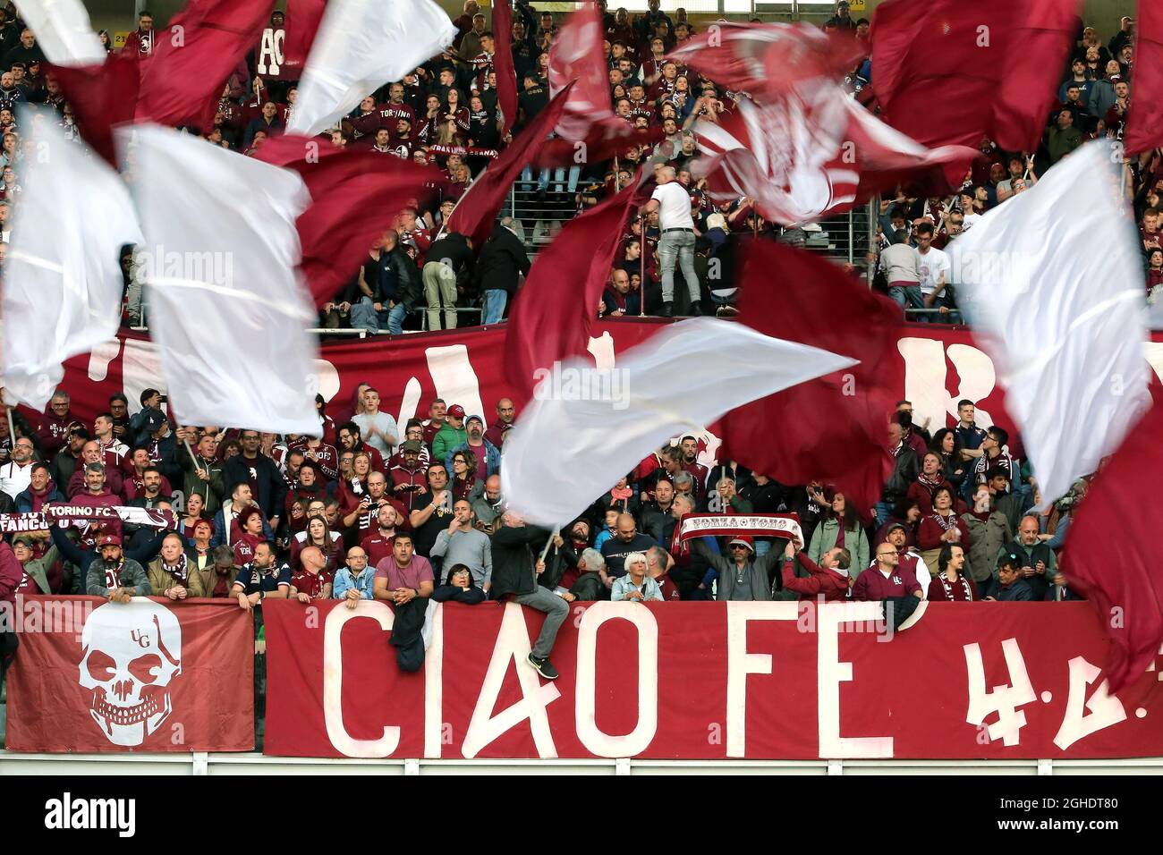 Torino FC fans pictured with scarves and flags during the Serie A match ...