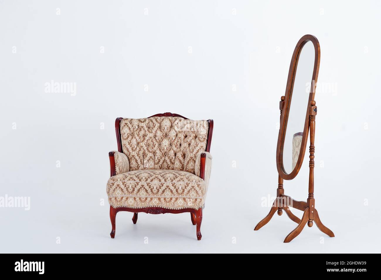 Mirror with chair isolated on white background Stock Photo - Alamy