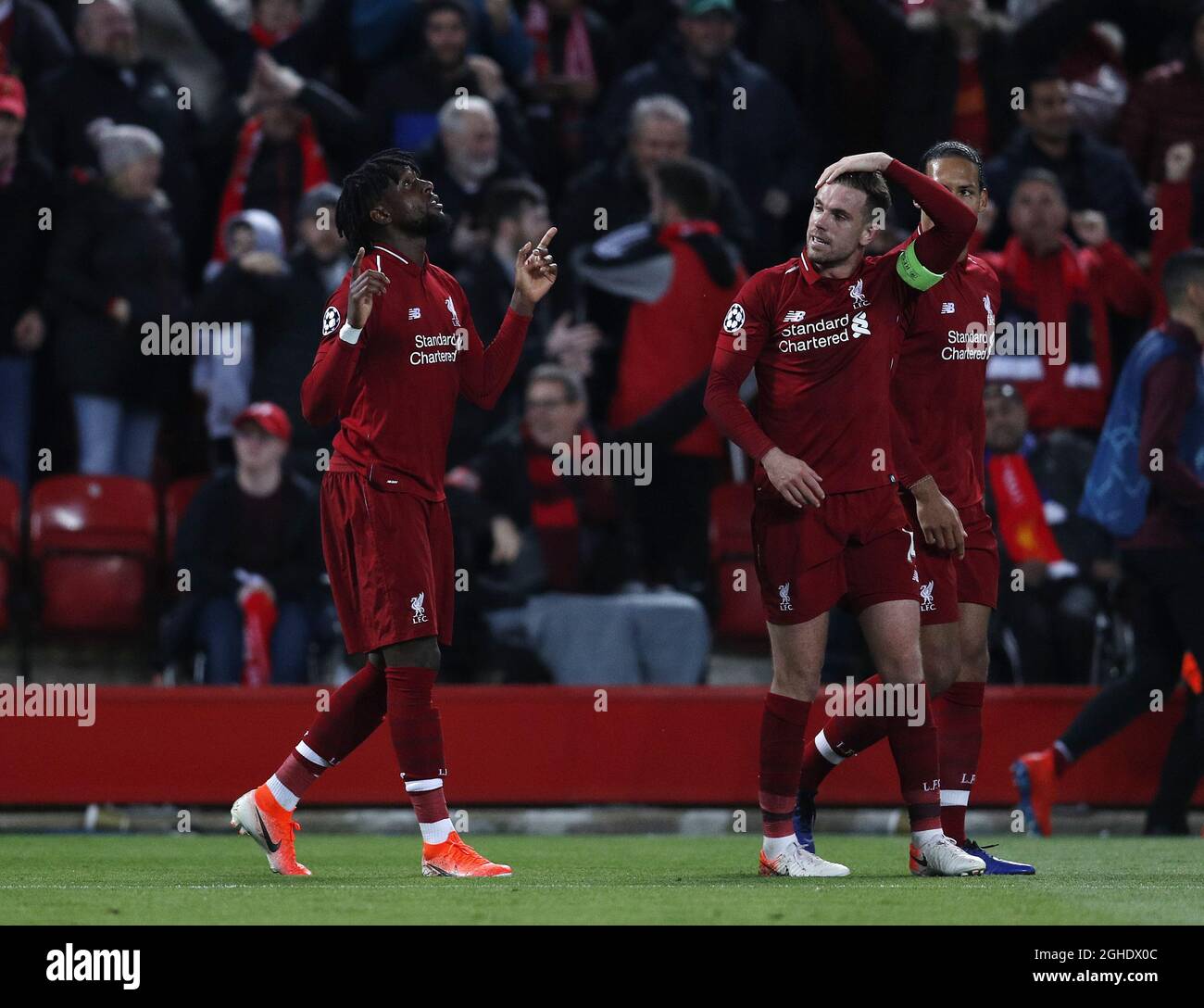 Liverpool's Divock Origi celebrates scoring his sides fourth goal ...
