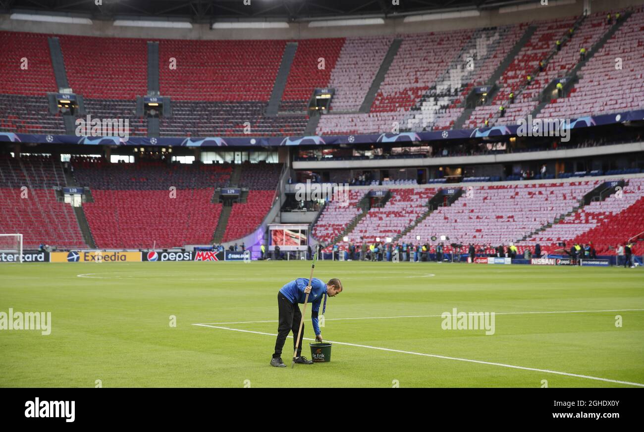 Groundsman attends to the pitch during the UEFA Champions League match ...