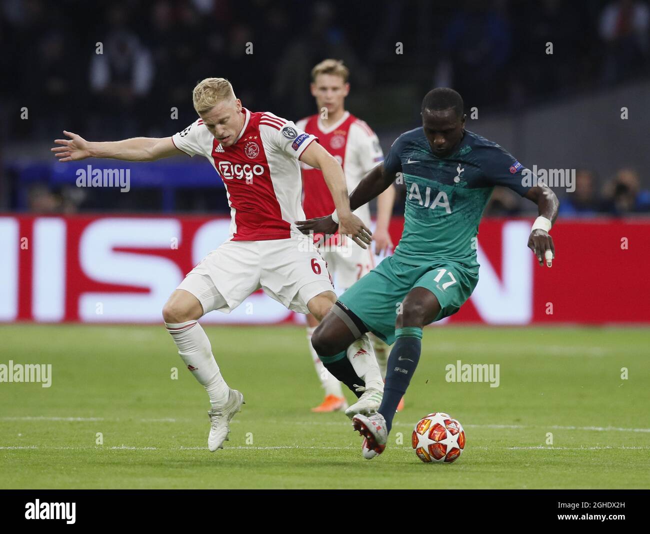 Donny van de Beek of Ajax tackles Moussa Sissoko of Tottenham during ...