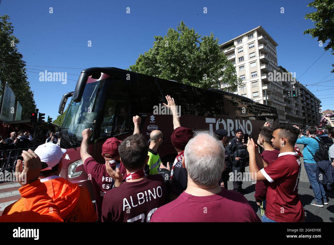 Torino FC fans applaud the team as it arrives on the bus at the stadium ...