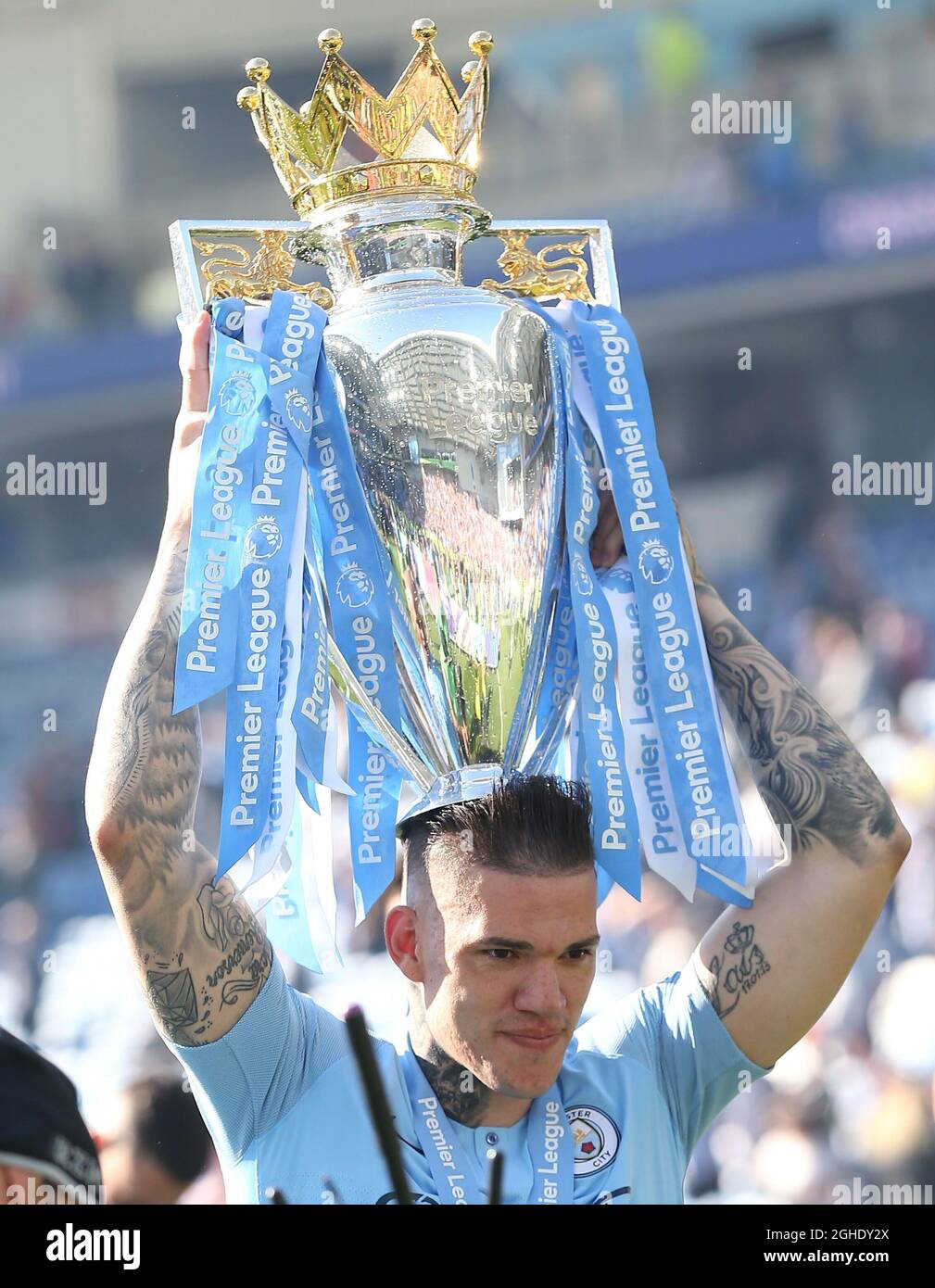 Ederson of Manchester City with the trophy during the Premier League ...